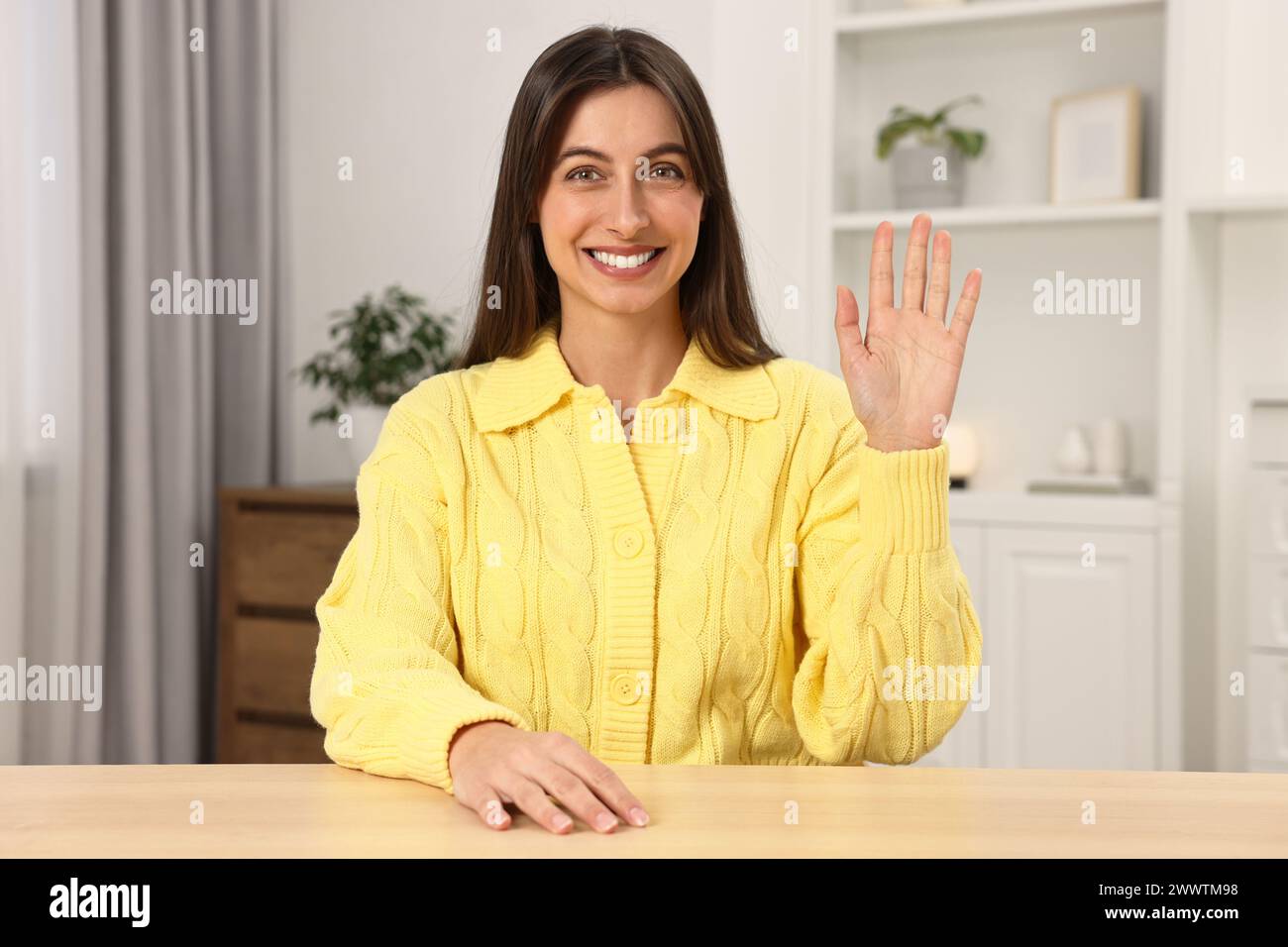 Hello welcome beautiful young woman hi-res stock photography and images ...