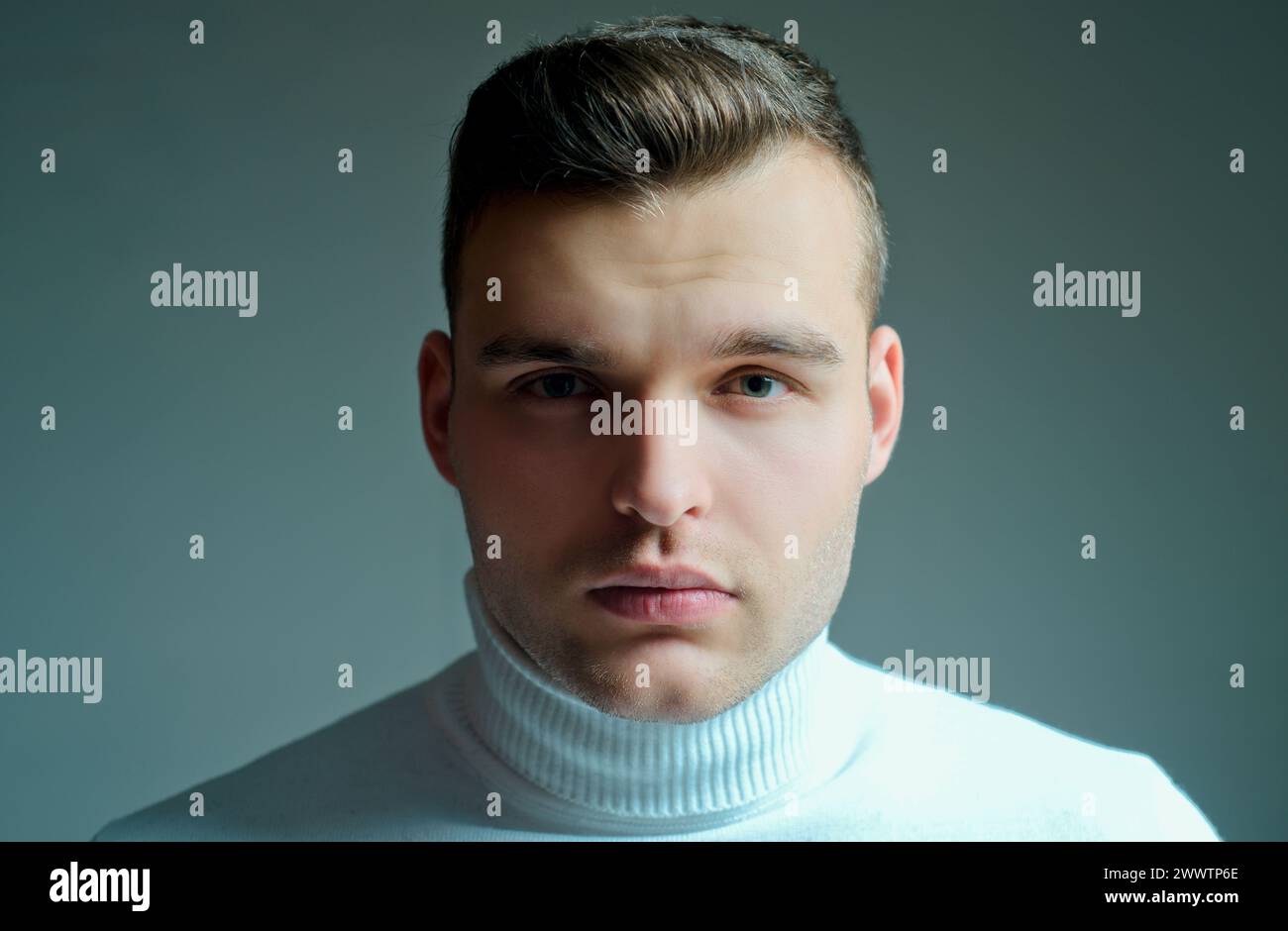 Man close up face with glossy hairstyle. Barbershop concept. Handsome ...