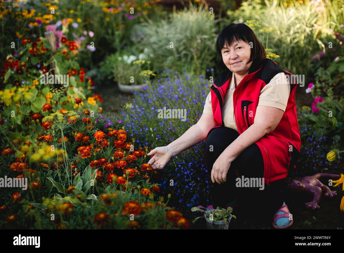 Mature gardener posing garden hi-res stock photography and images - Alamy