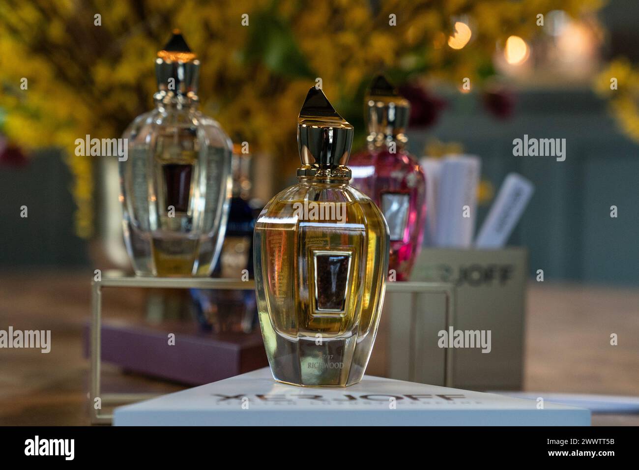 New York, USA. 25th Mar, 2024. Bottles of perfume on display during ...