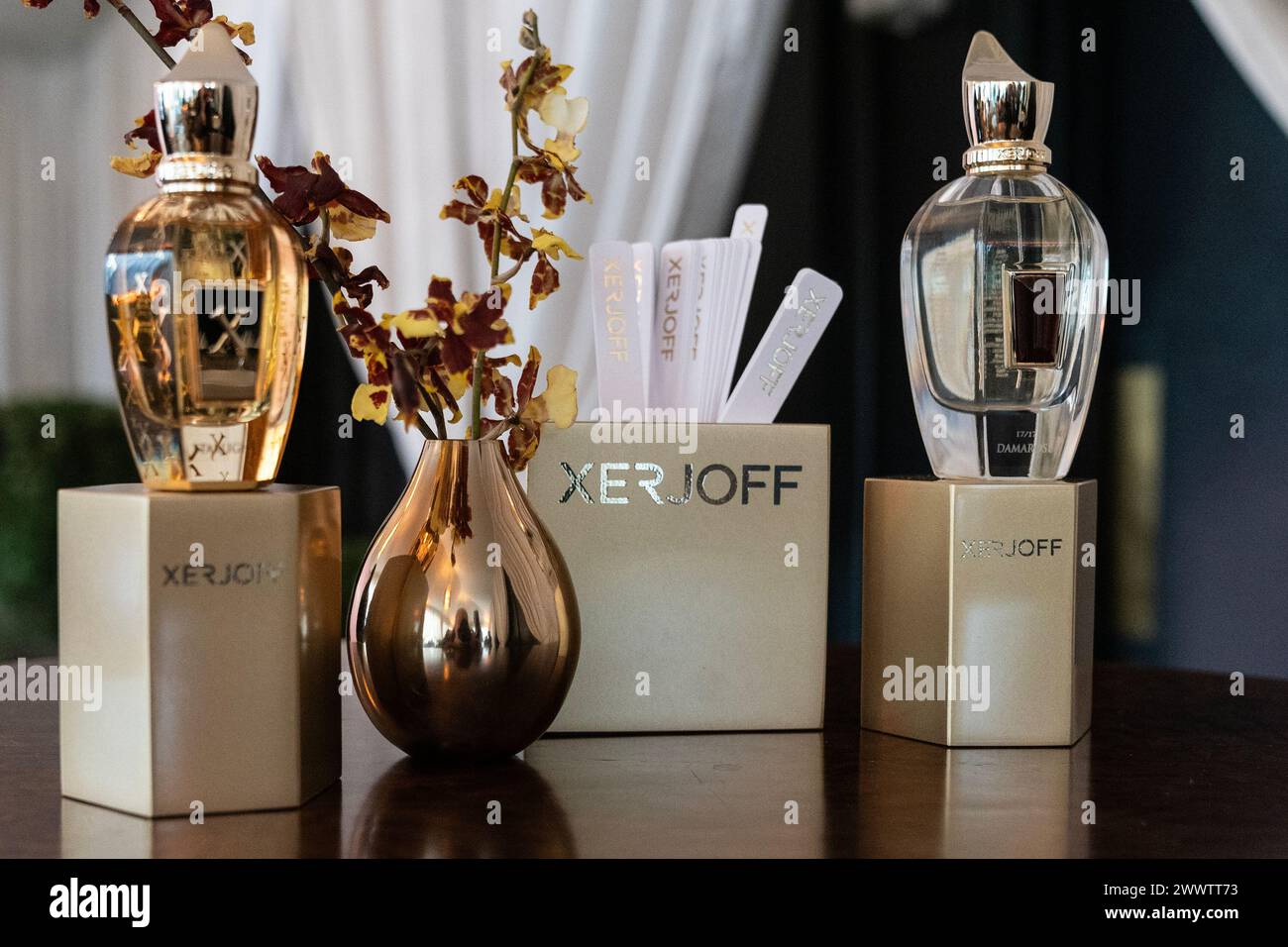 New York, USA. 25th Mar, 2024. Bottles of perfume on display during ...