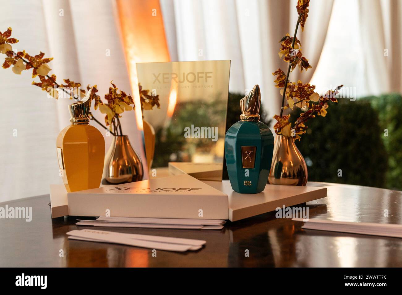 New York, USA. 25th Mar, 2024. Bottles of perfume on display during ...