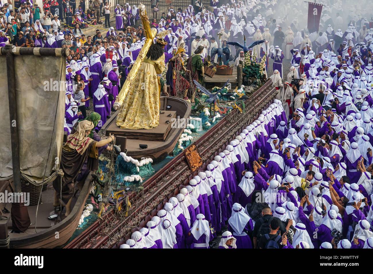 Antigua, Guatemala. 24th Mar, 2024. Catholic penitents carry the ...