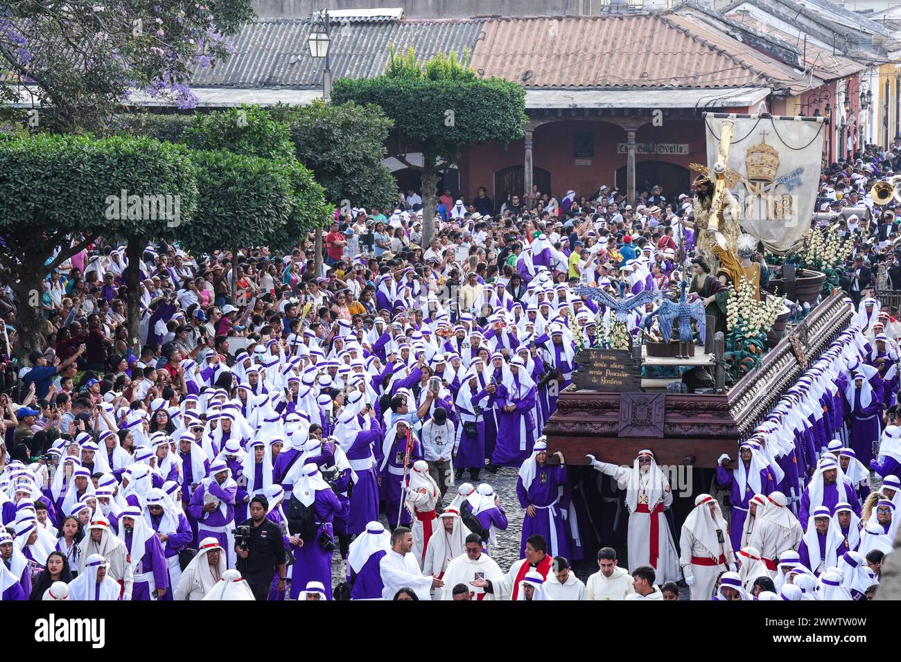 Antigua, Guatemala. 24th Mar, 2024. Catholic penitents surround the ...