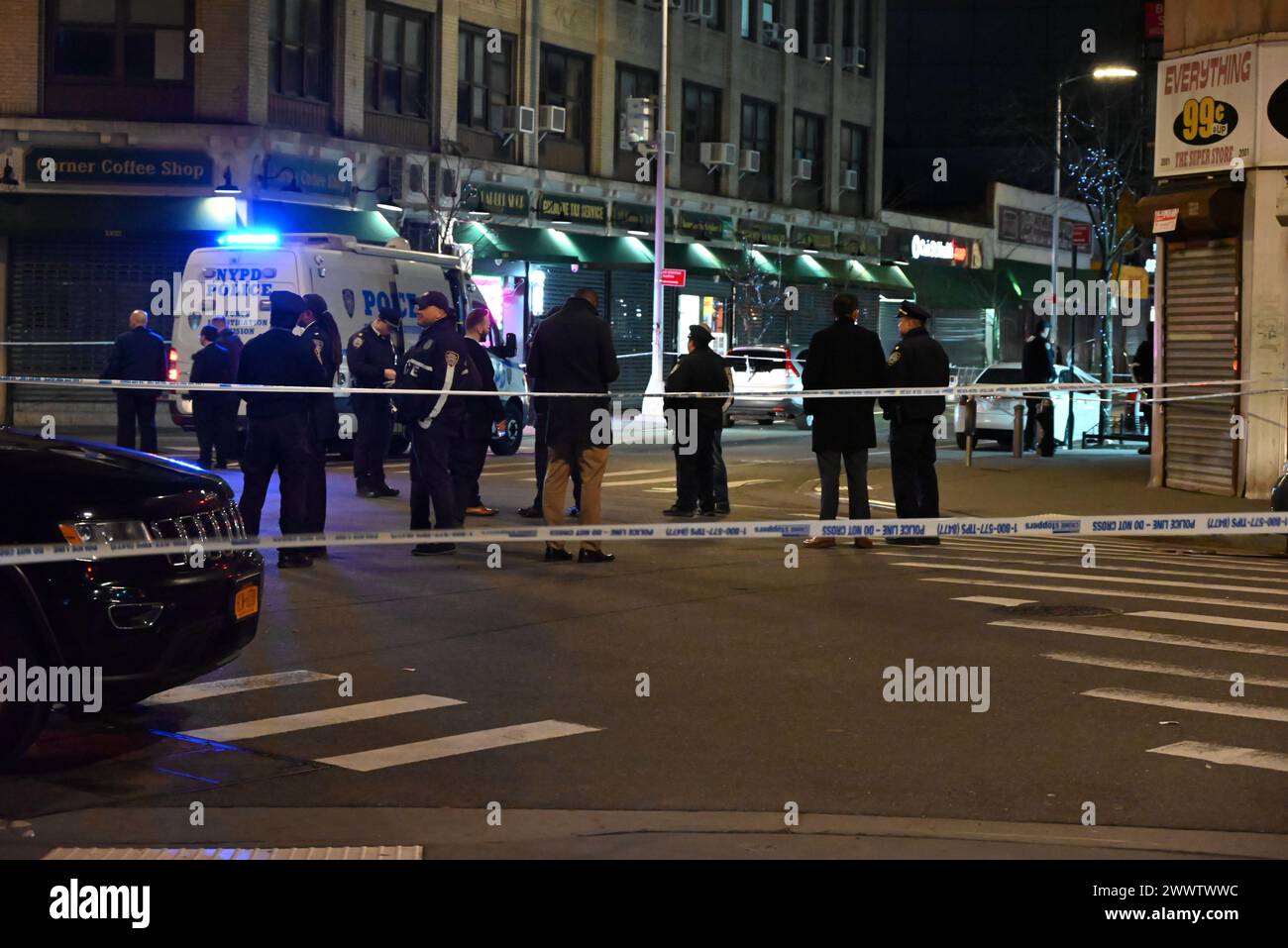Queens, New York, USA. 25th Mar, 2024. Investigators scour the area of Mott Avenue for evidence ...