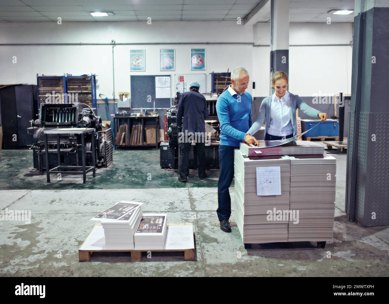 Printing, warehouse and man and woman with paper for teamwork ...