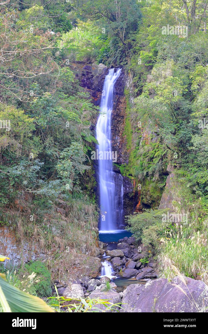 Water falls in the Neidong Forest Recreation Area situated at the ...