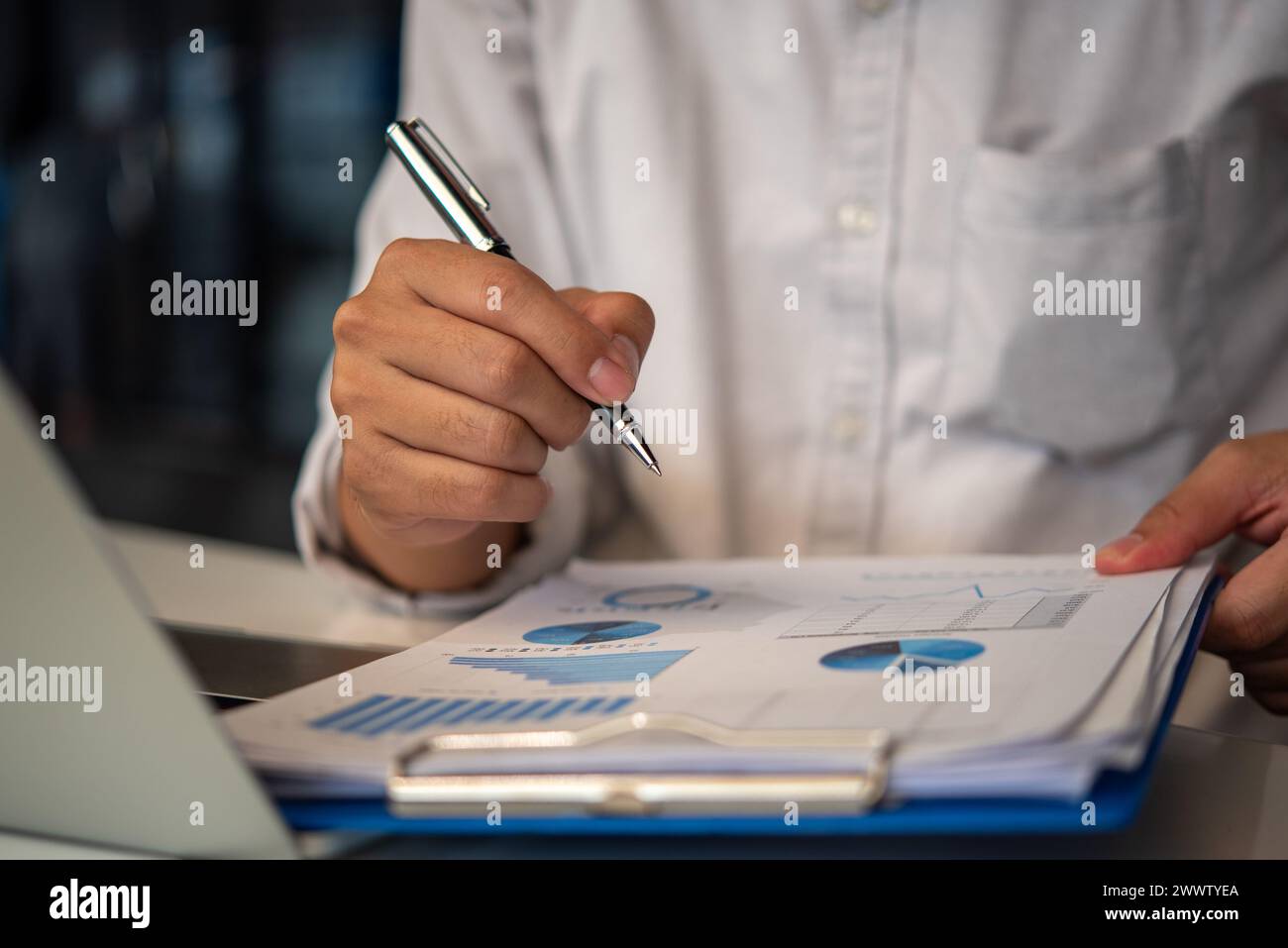 man holding clipboard with checklist employee workplace is reviewing ...