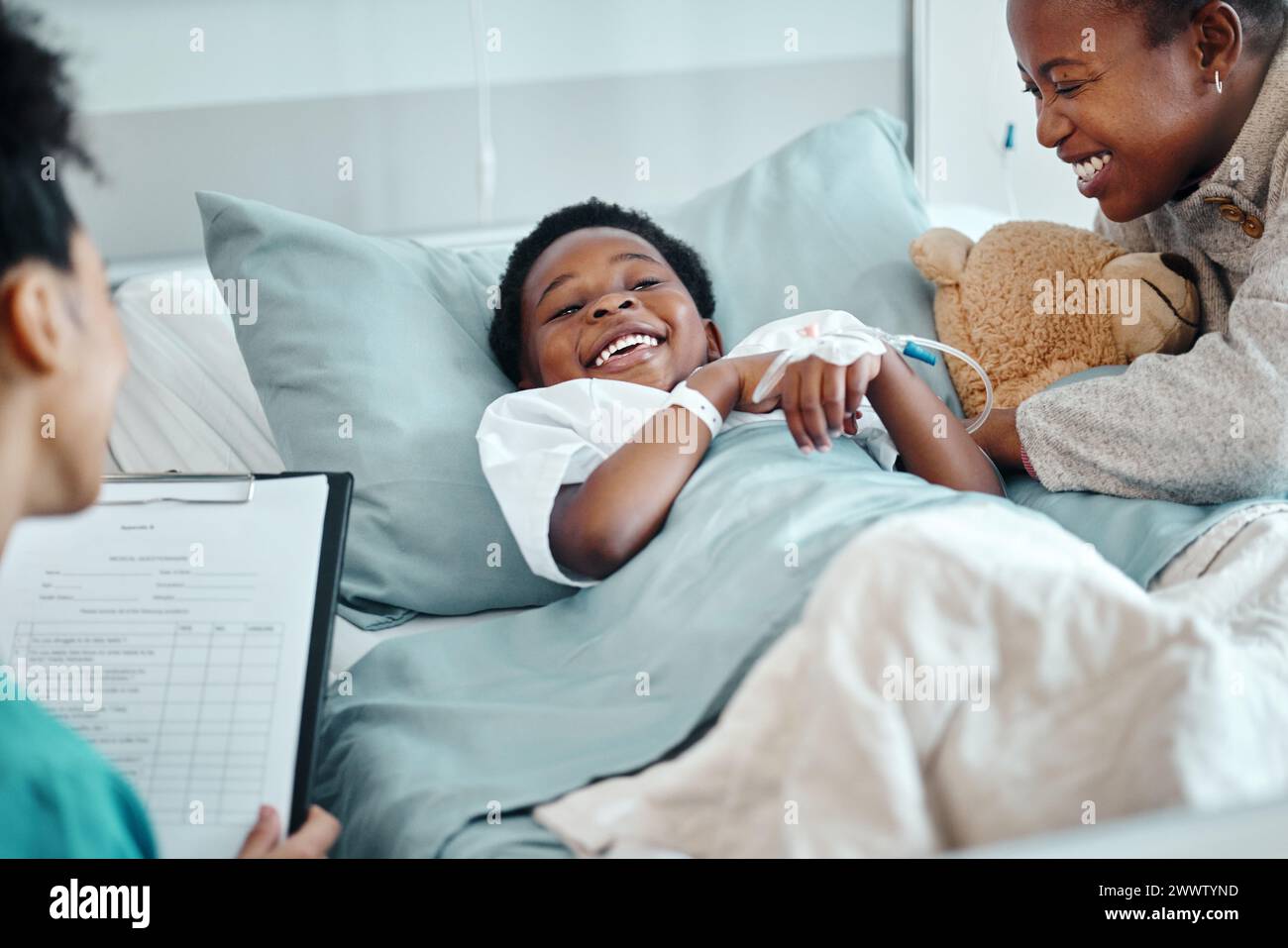Pediatrician, child and mother for hospital examination with paperwork ...