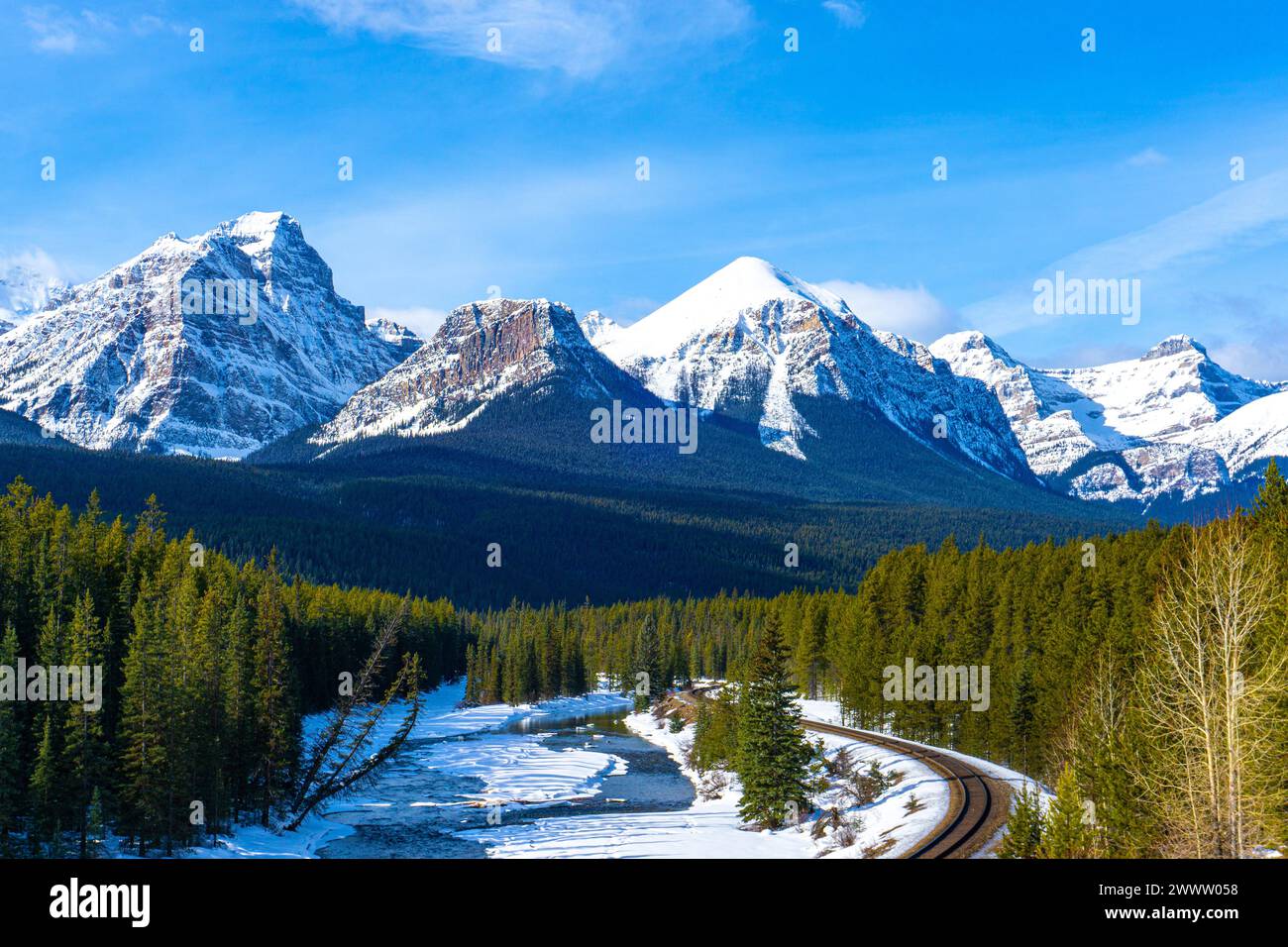 Winter in the Canadian Rockies at Morant's Curve featuring snow-covered ...