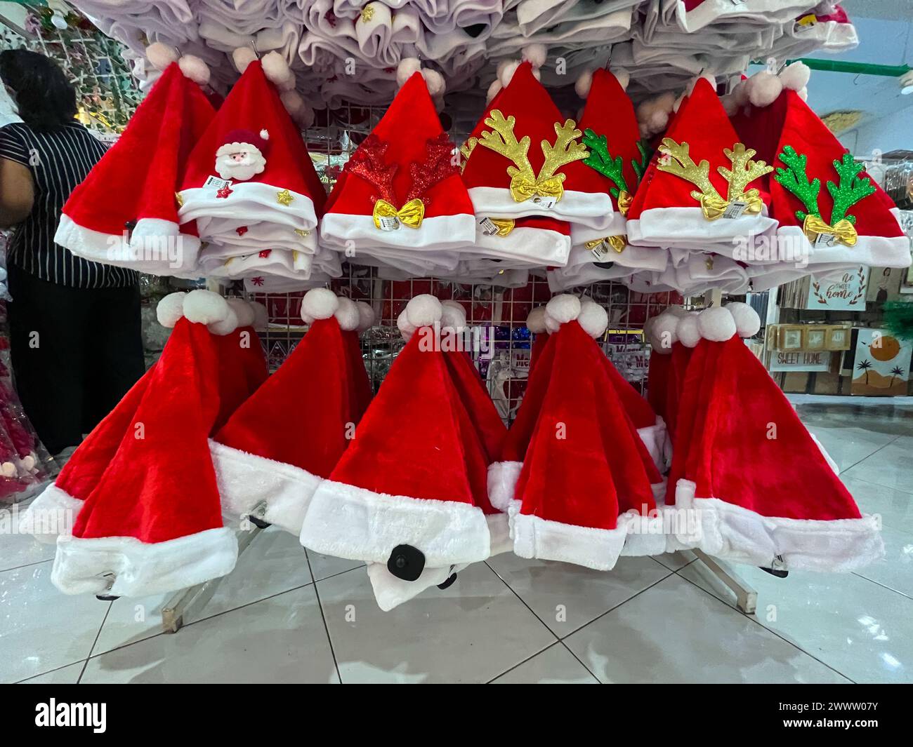 Red Santa Claus hats are sold in shops ahead of Christmas celebrations ...