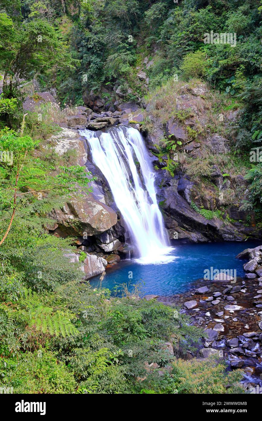 Water falls in the Neidong Forest Recreation Area situated at the ...
