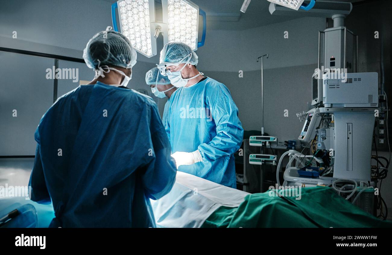 Surgery, light or surgeons with teamwork for emergency, accident or ...
