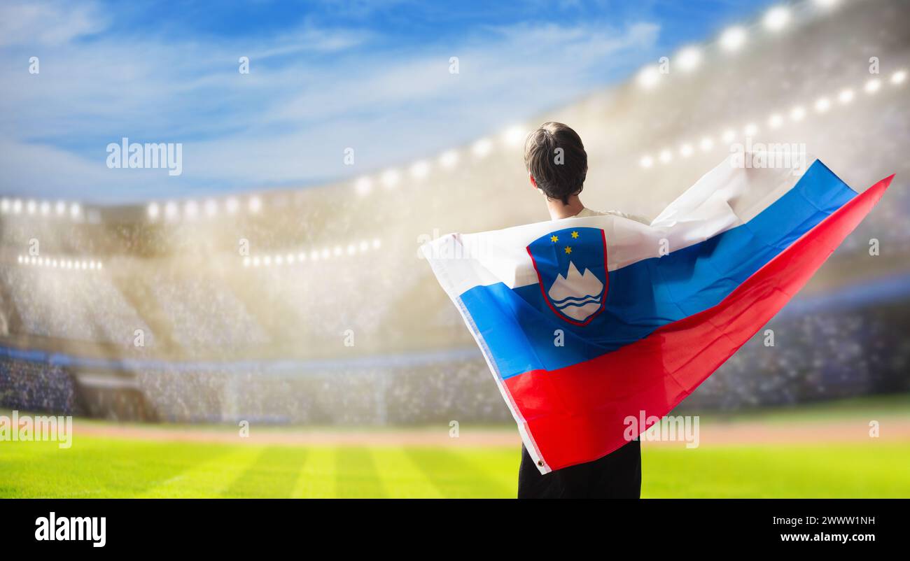 Slovenia football supporter on stadium. Slovenian fans on soccer pitch ...