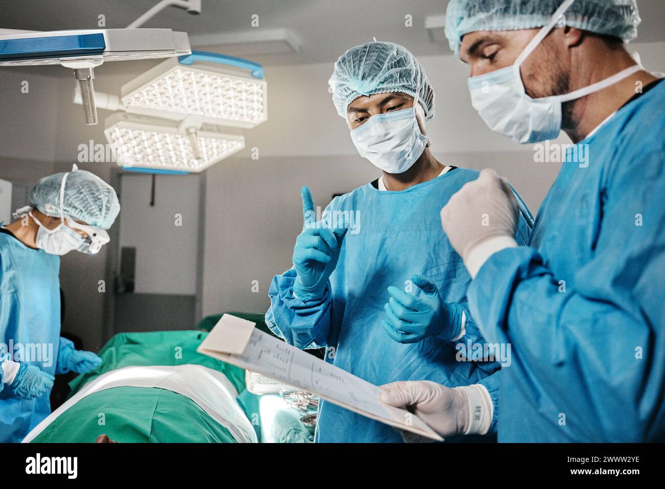 Surgery, documents or surgeons with teamwork for emergency, accident or ...