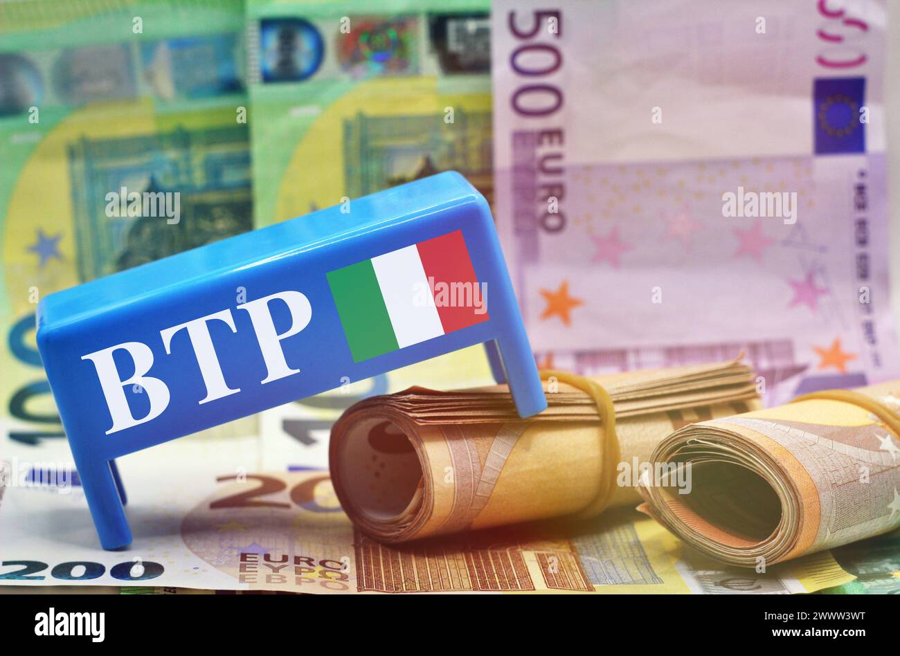 Table with european banknotes as background with the text “BTP ...