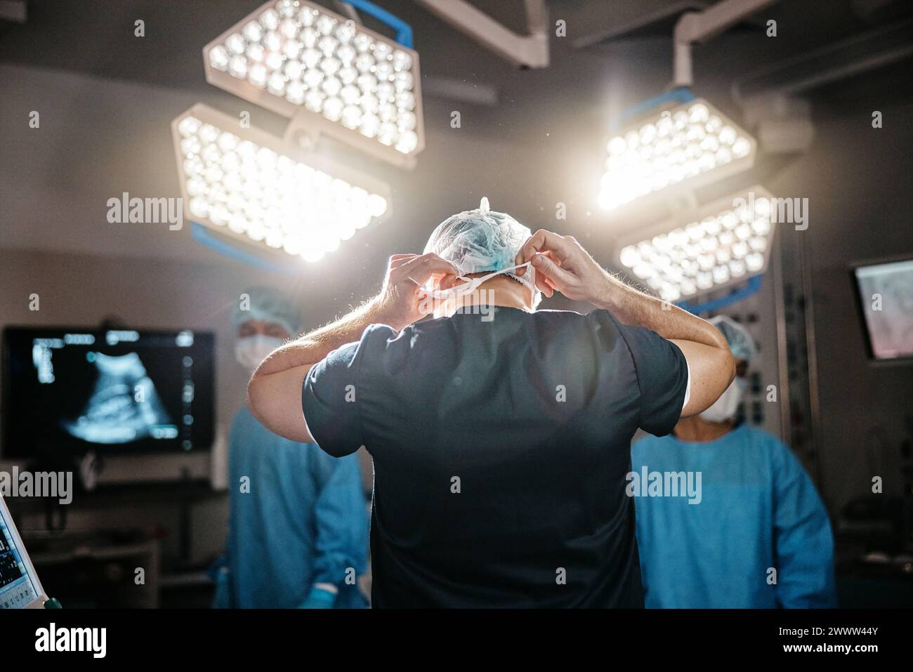 Medical preparation, cap and doctor in operating room for surgery ...