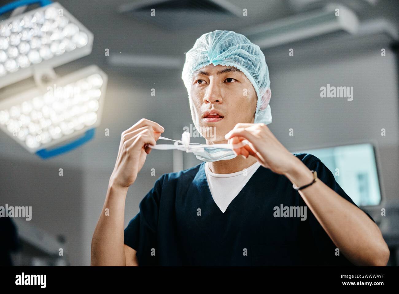 Medical, uniform and doctor in theatre for surgery, safety and ...