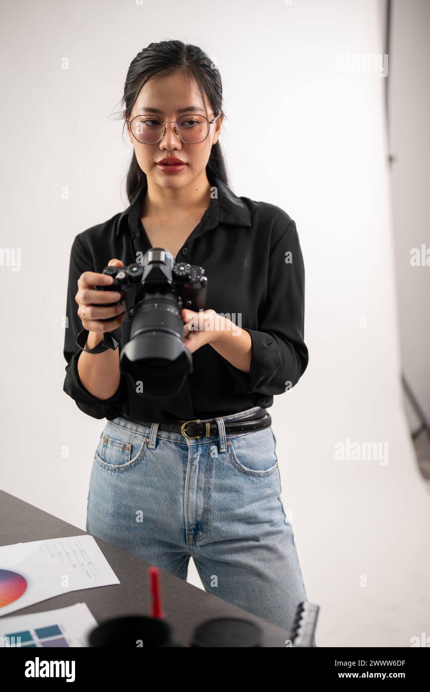 Preparing for a photoshoot photographer hi-res stock photography and ...
