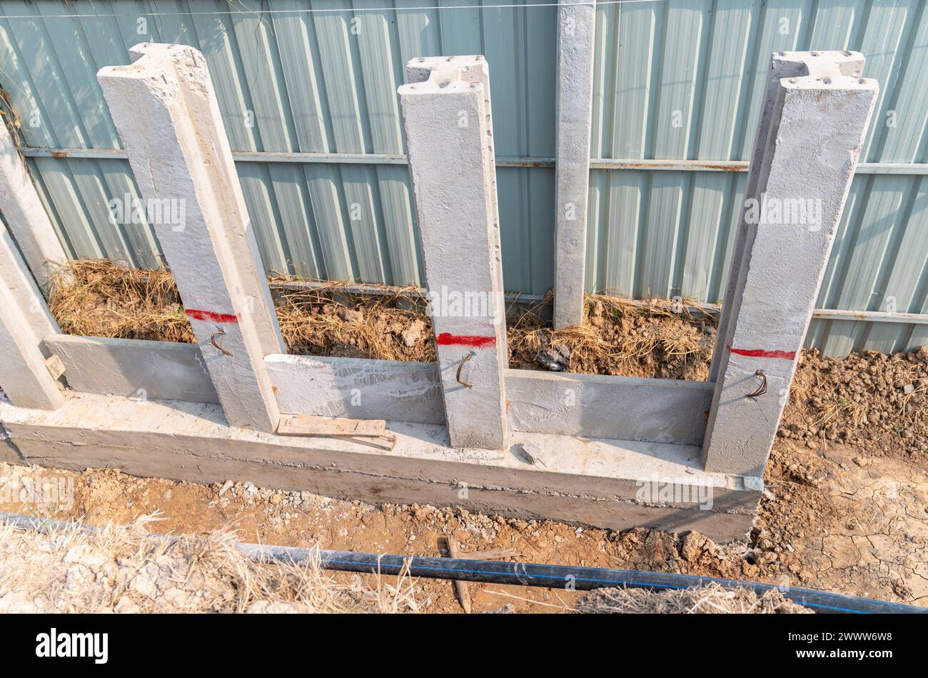 Build retaining wall with pile and prefabricated concrete panels in ...