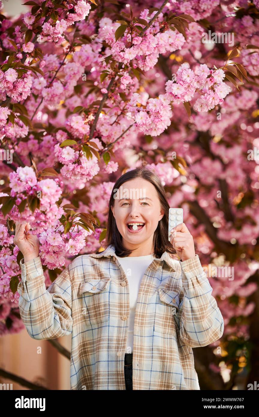 Woman allergic suffering from seasonal allergy at spring. Young happy ...