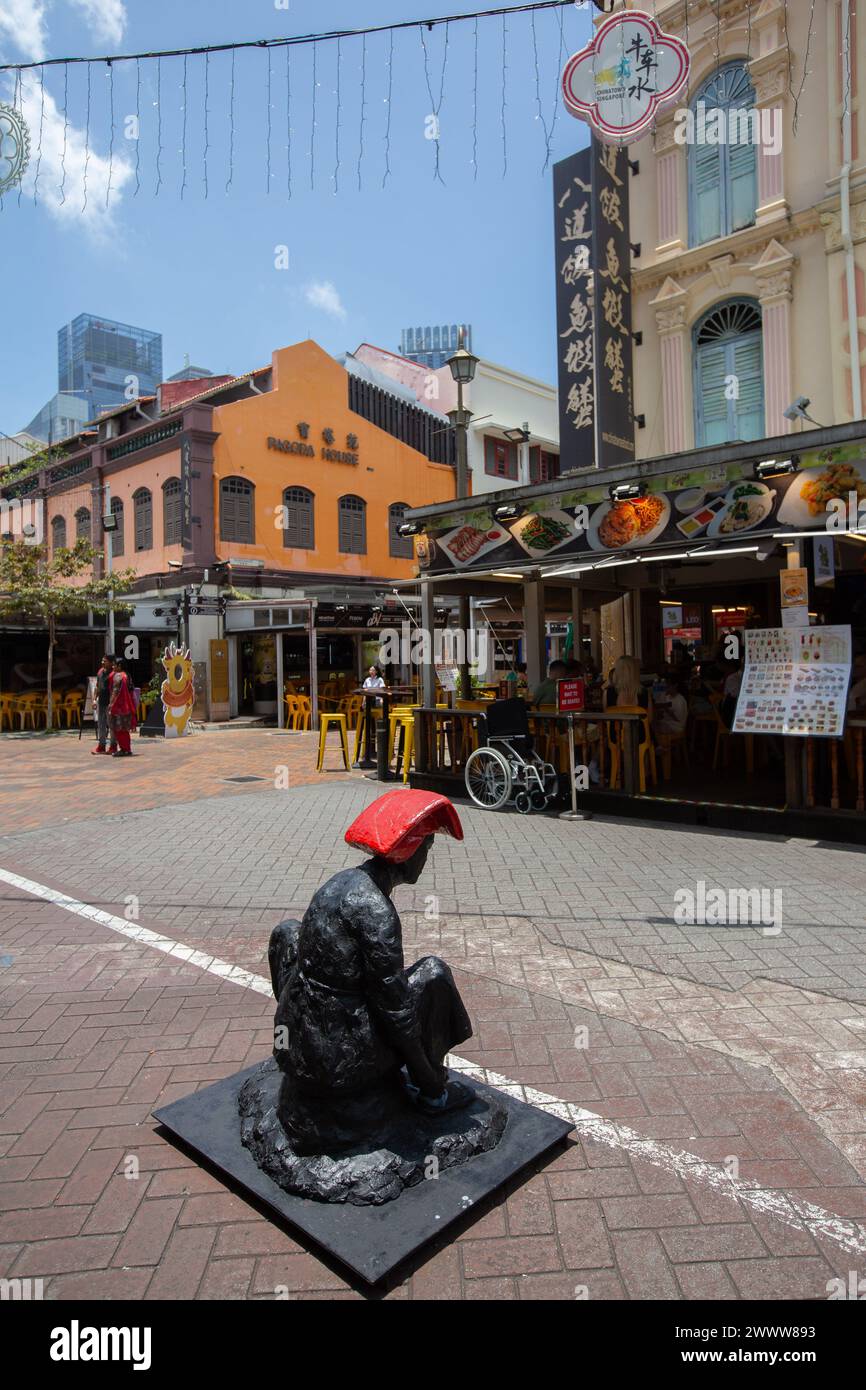 March 2024. Chinatown street culture scene, Samsui woman sculpture ...