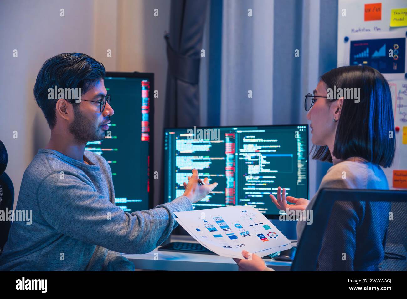 asian and Indian Developer devops team discussion about coding promgram ...