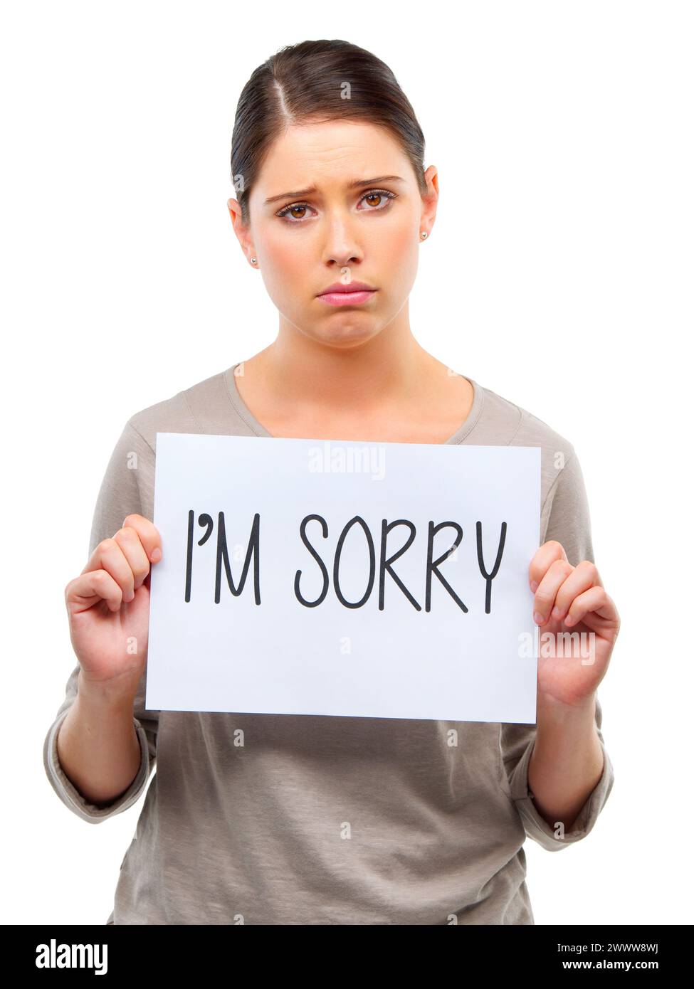 Sad, portrait and woman with Im sorry poster in studio with mistake ...
