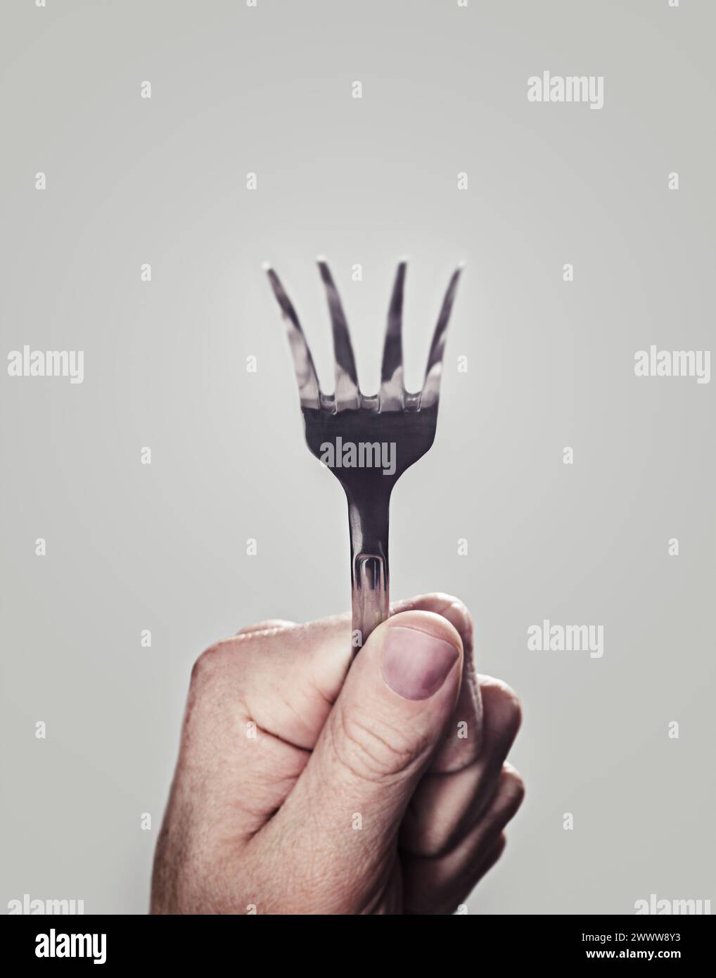 Bending, fork and hand with closeup, person and utensils with kitchen ...