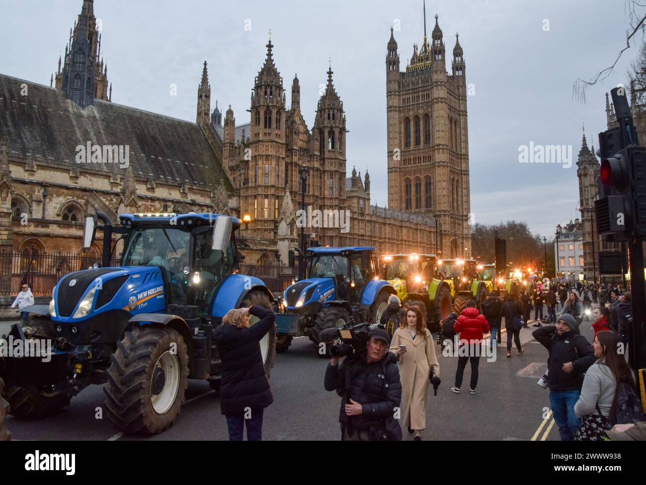 London, UK. 25th March 2024. British farmers in tractors stage a ...