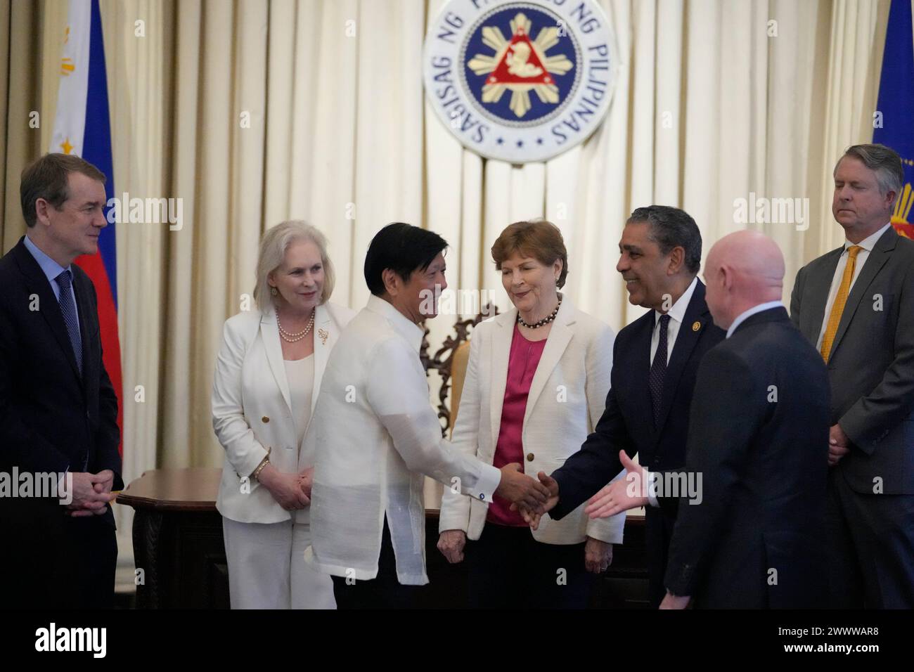 Philippine President Ferdinand Marcos Jr., third from left, greets US ...