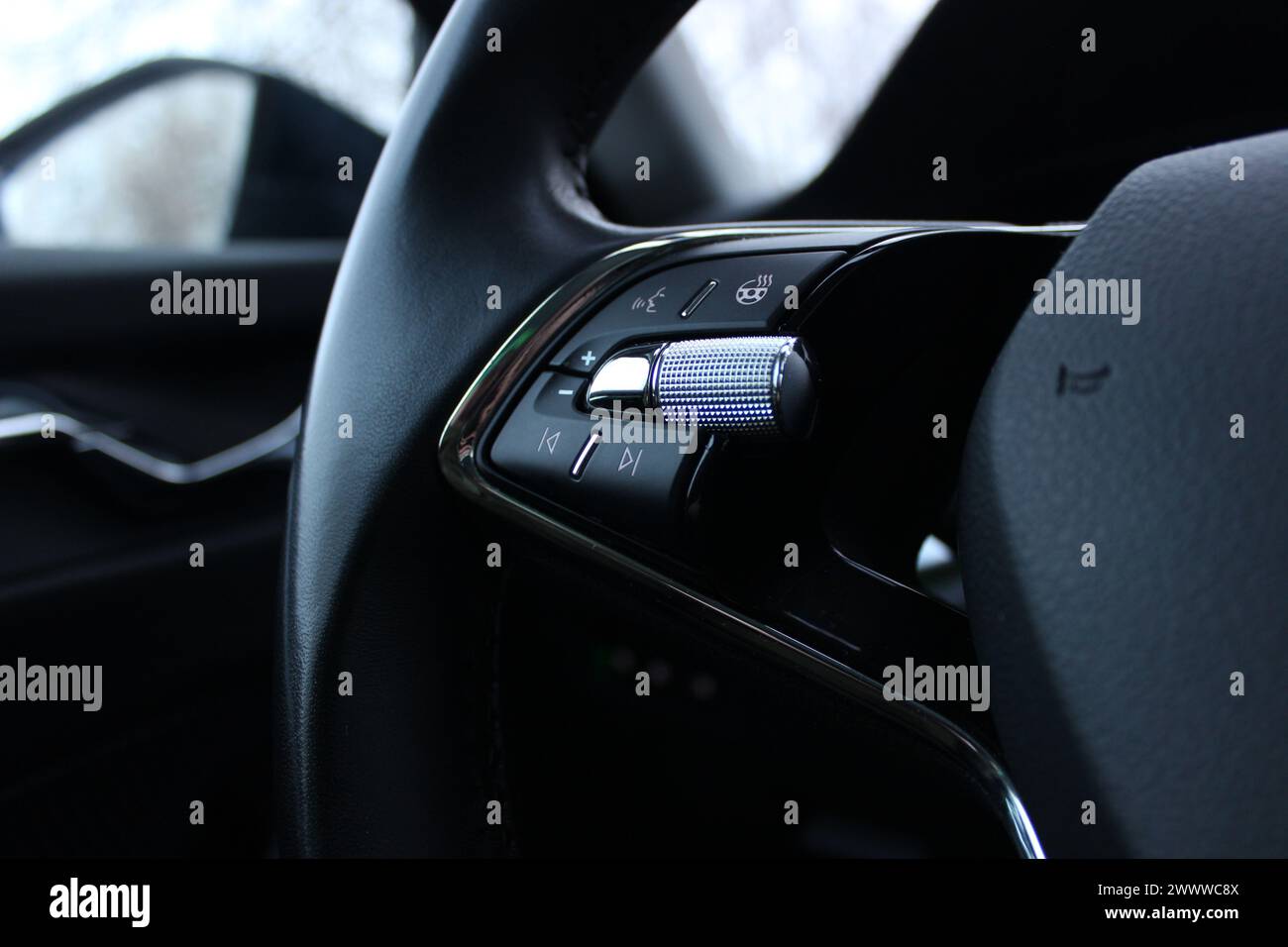 Electronic mode switch buttons on the multifunction steering wheel of a ...