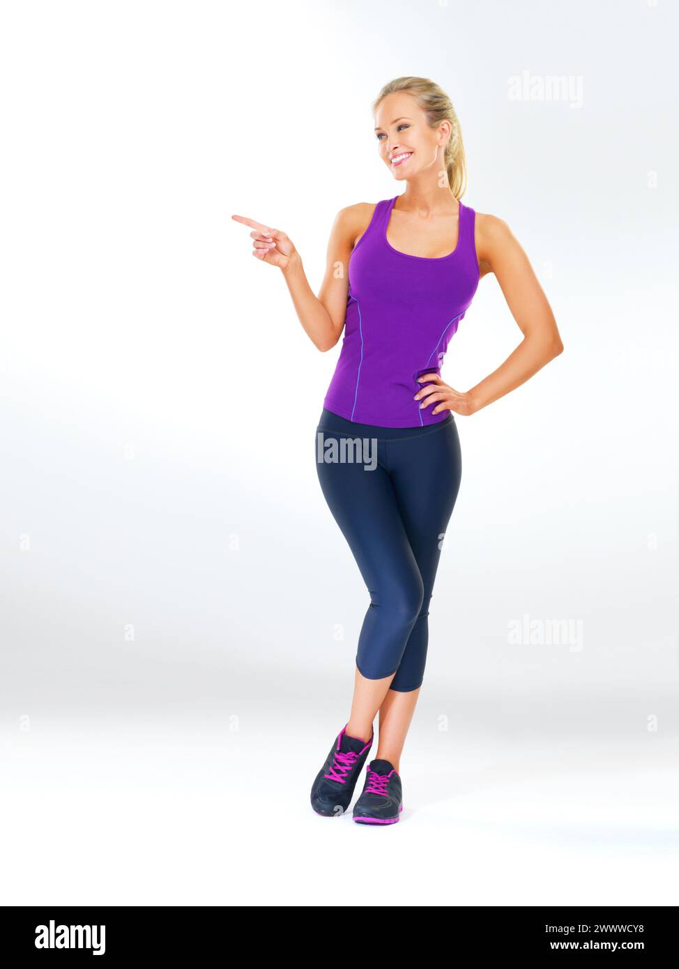 Athletic female model pointing hi-res stock photography and images - Alamy