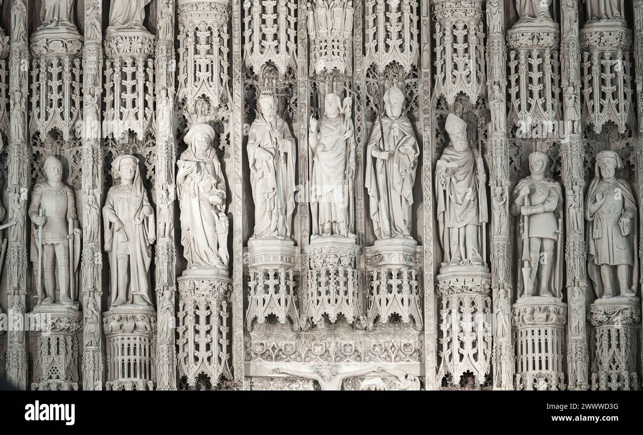 Stone statues, of important christian models, behind the altar in the ...