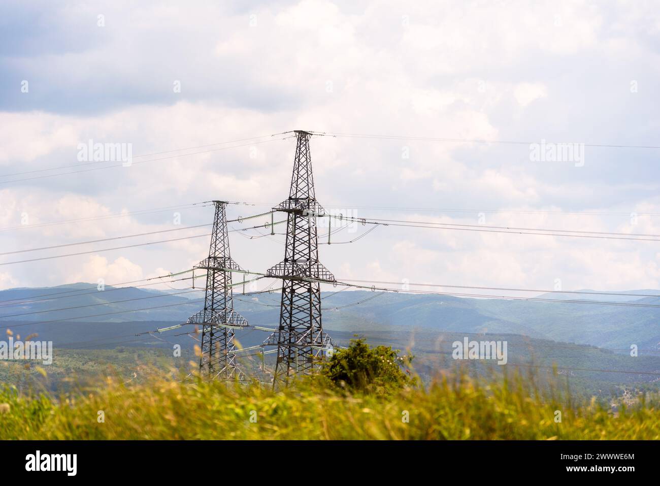 High voltage towers Electric pole. Power line support with wires for ...