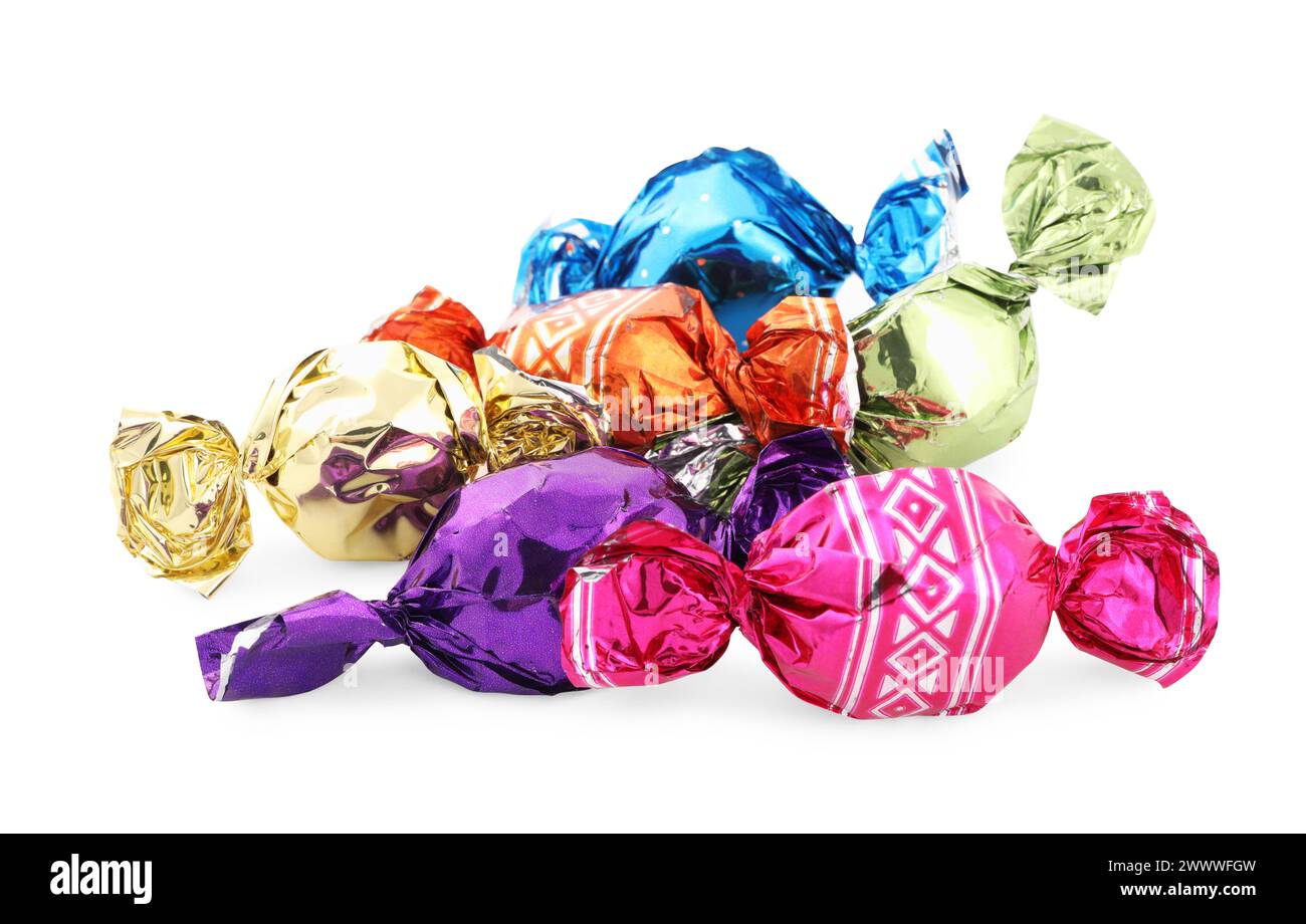 Sweet candies in colorful wrappers on white background Stock Photo - Alamy