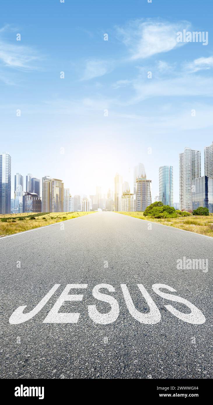 Closeup view of the text of Jesus on the asphalt road. Christian ...
