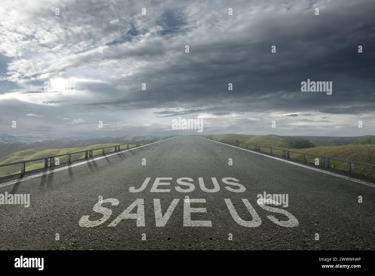 Closeup view of the text of Jesus save us on the asphalt road ...