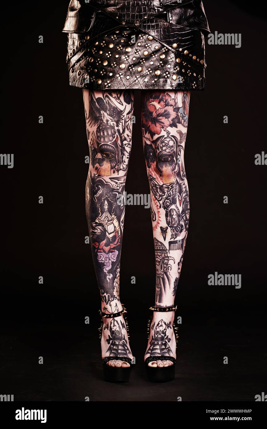 Fashion, legs and closeup of woman shoes in studio with tattoo gothic ...