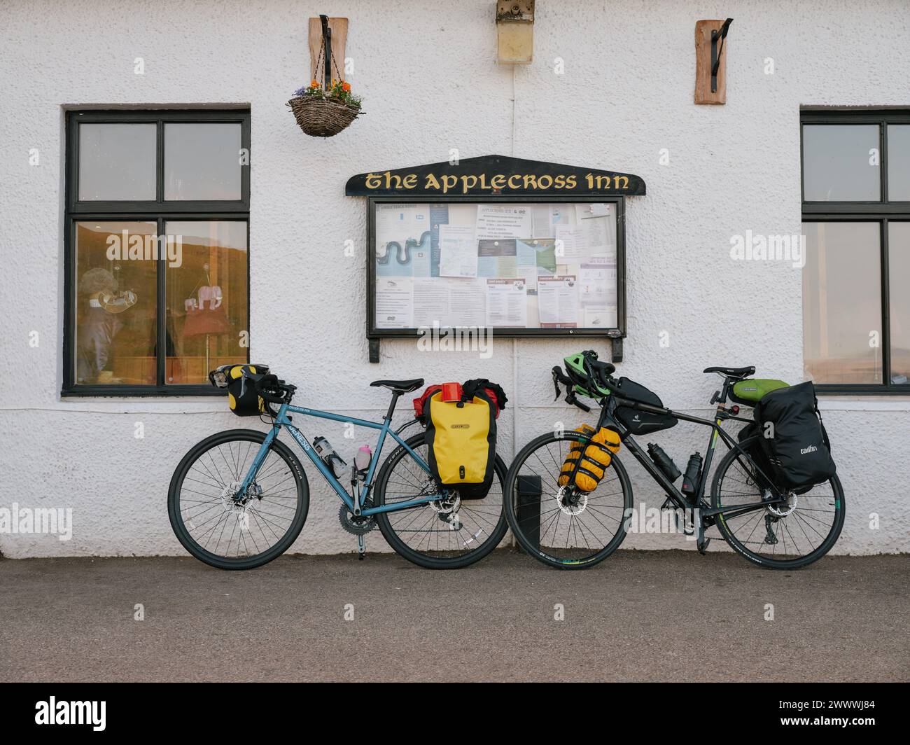 Two touring bicyles outside the Applecross Inn in Applecross, Wester ...