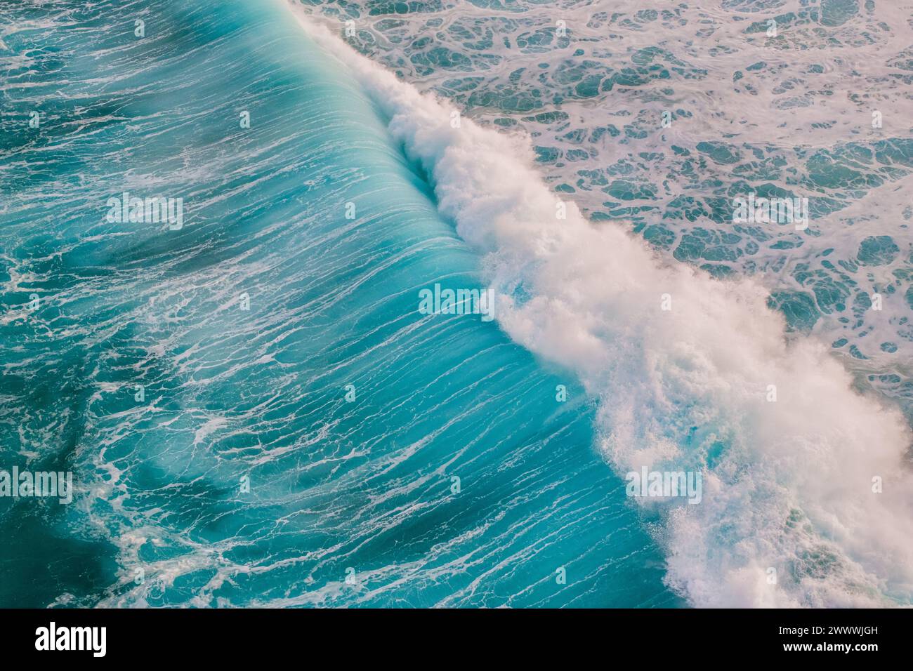 A drone view of a large breaking wave on the North Shore of Oahu ...
