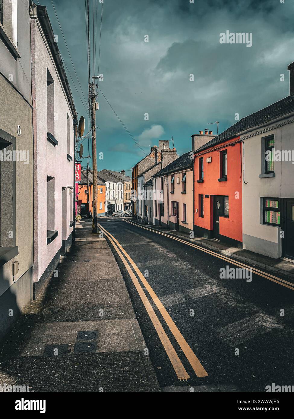A sleepy Irish town with some colorful houses Stock Photo - Alamy