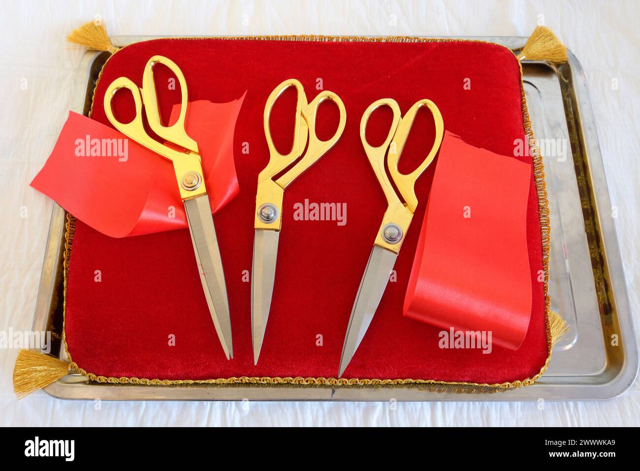Three ribbon cutting scissors for grand opening of the new institution ...