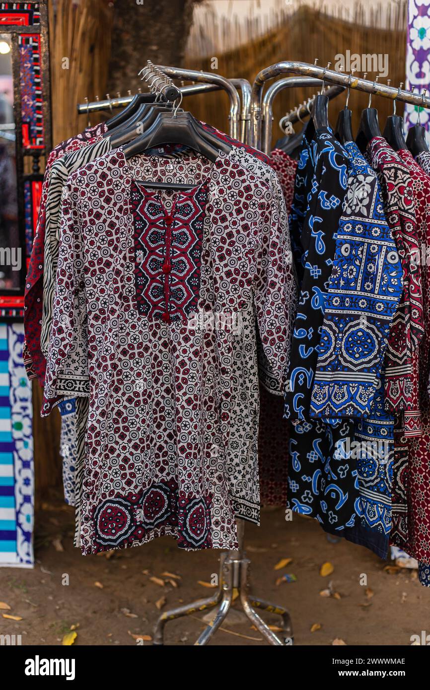 Local market scene with colorful traditional clothing in the bustling ...