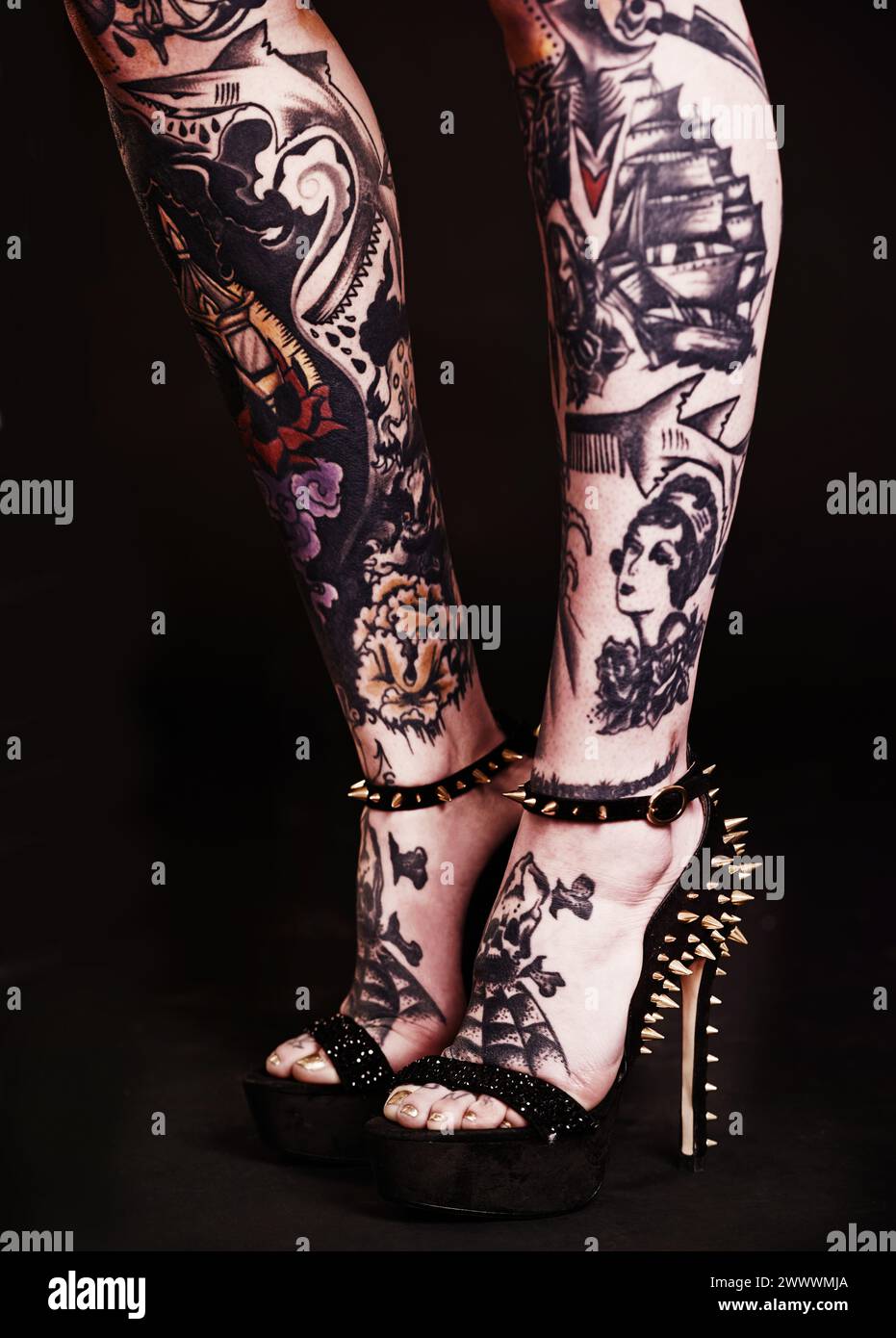 Tattoo, shoes and closeup of woman feet in studio with fashion gothic ...