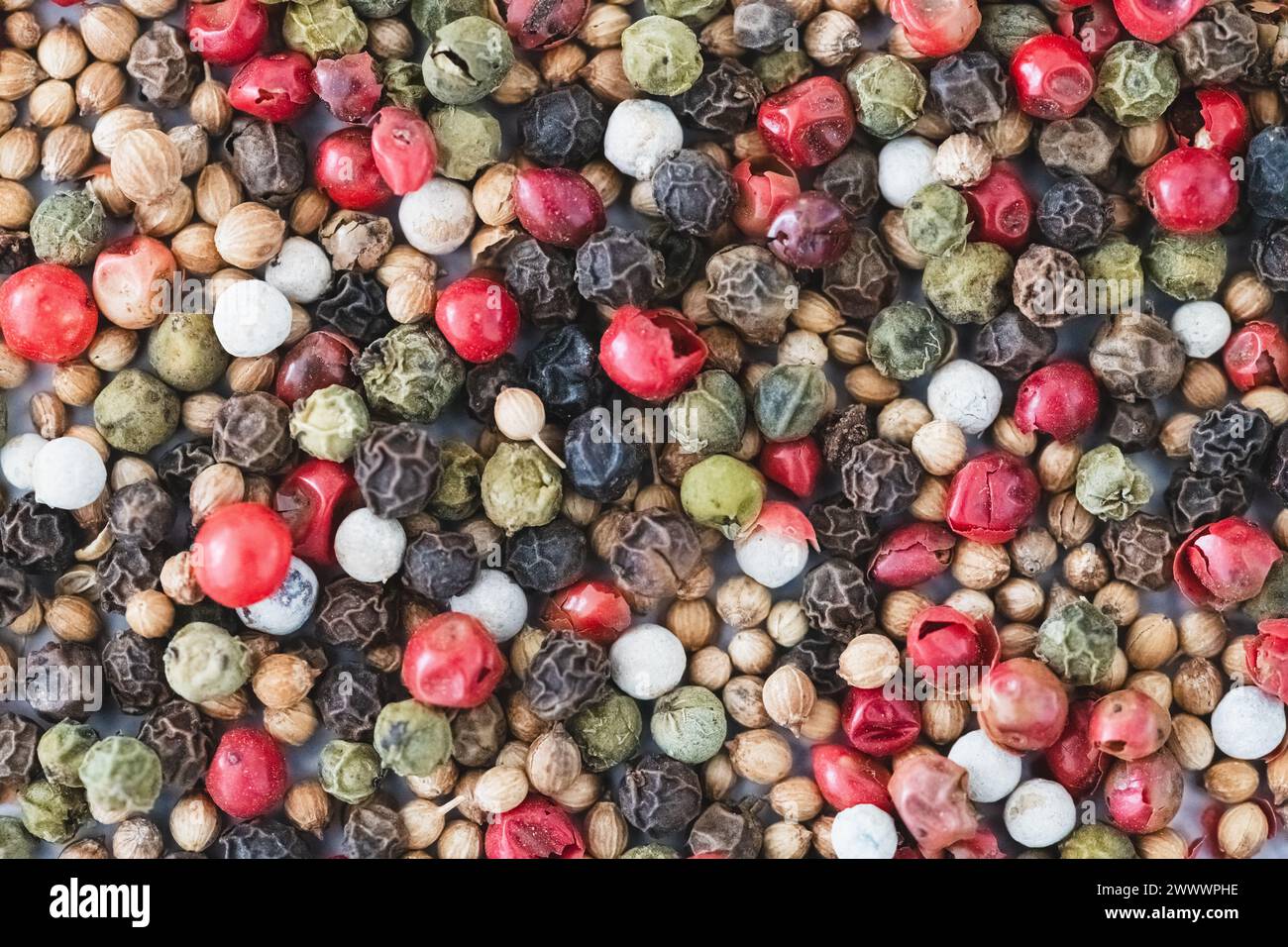 Texture photo with mix pepper and coriander seasoning Stock Photo - Alamy