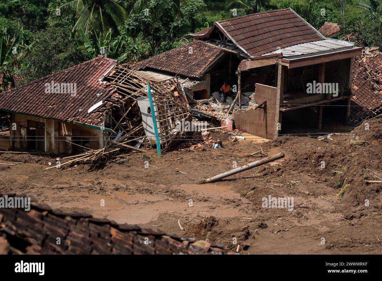 LANDSLIDES CAUSED BY HEAVY RAIN Houses were severely damaged by a ...