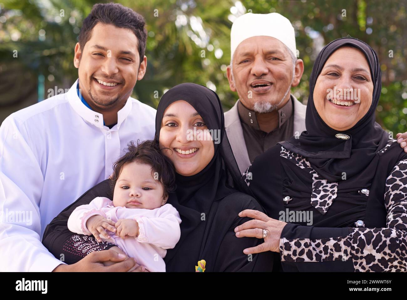 Park, muslim and portrait of family with child for bonding, ramadan and ...