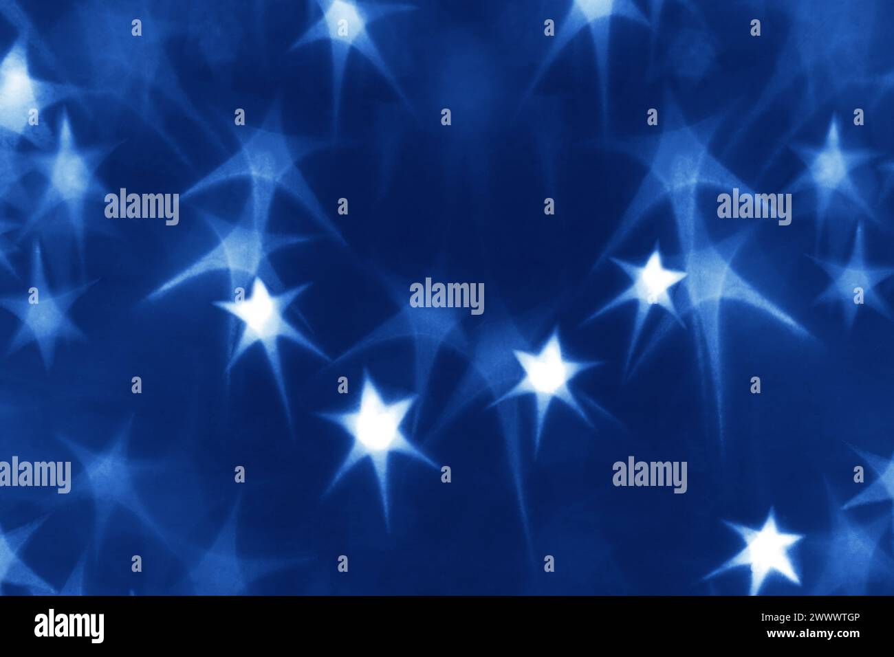 Holiday background with glowing stars Stock Photo - Alamy