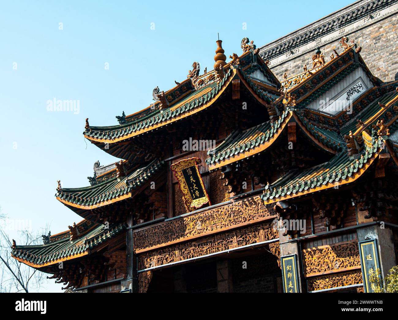 The traditional Chinese brick and wood architecture under sunlight in ...